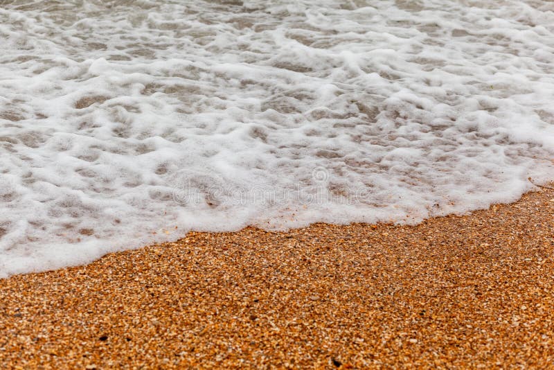 Sea Waves on the Sandy Shore on a Cloudy Day. Rest on the Sea Stock ...