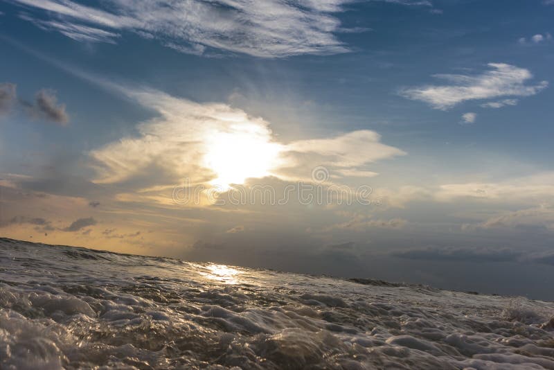 Sea waves and sky sets stock image. Image of orange - 104163939