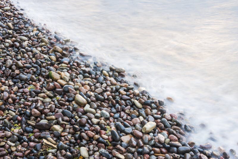 Sea Waves on Small Rocks at Seashore Stock Photo - Image of nature ...
