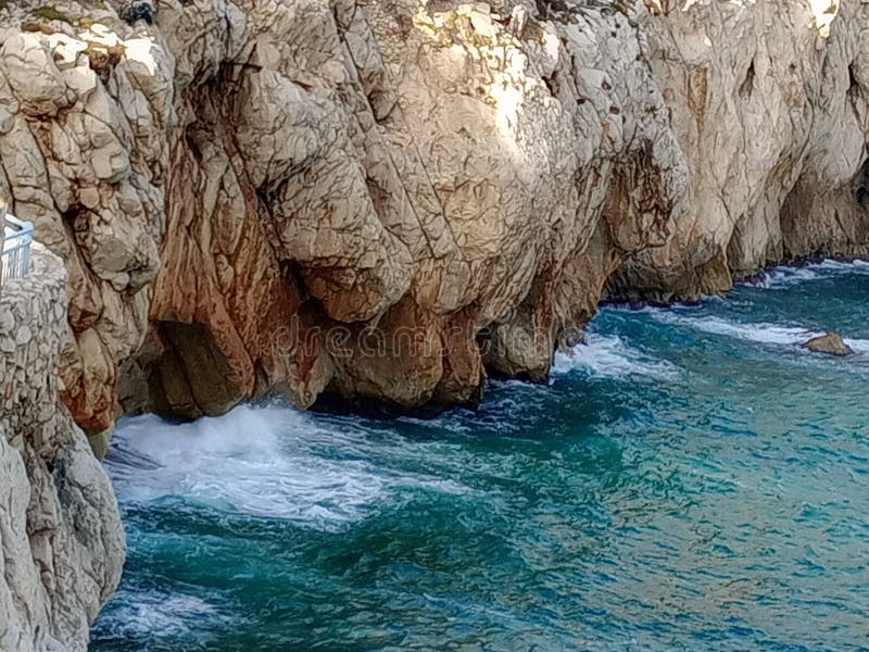 Sea Waves Splash Over the Rocks on the Shore in Gibraltar, Spain Stock ...