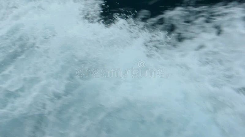 Splashing Sea Water on a Pebble Beach. Sea Water Waves in Summer Stock ...