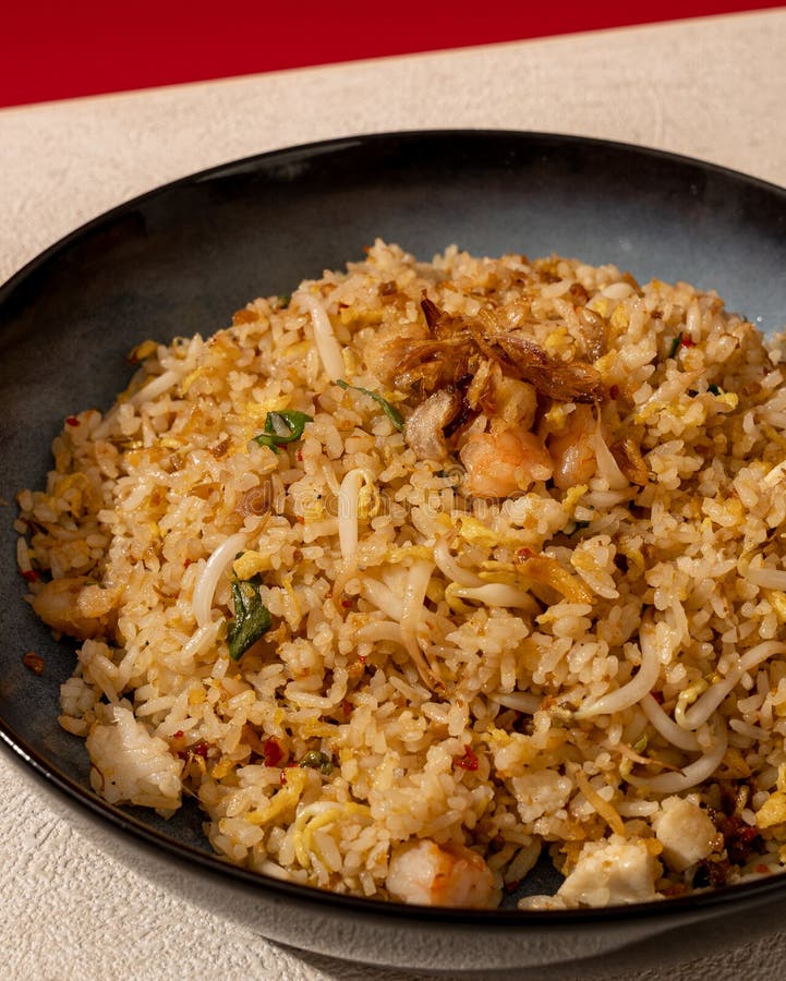 Seafood Fried Rice is a Dish of Rice Fried in a Pan Which Produces a ...