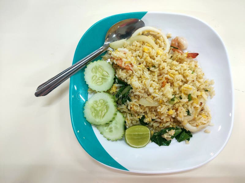 Seafood Fried Rice on a Plate Stock Photo - Image of food, plate: 374920986