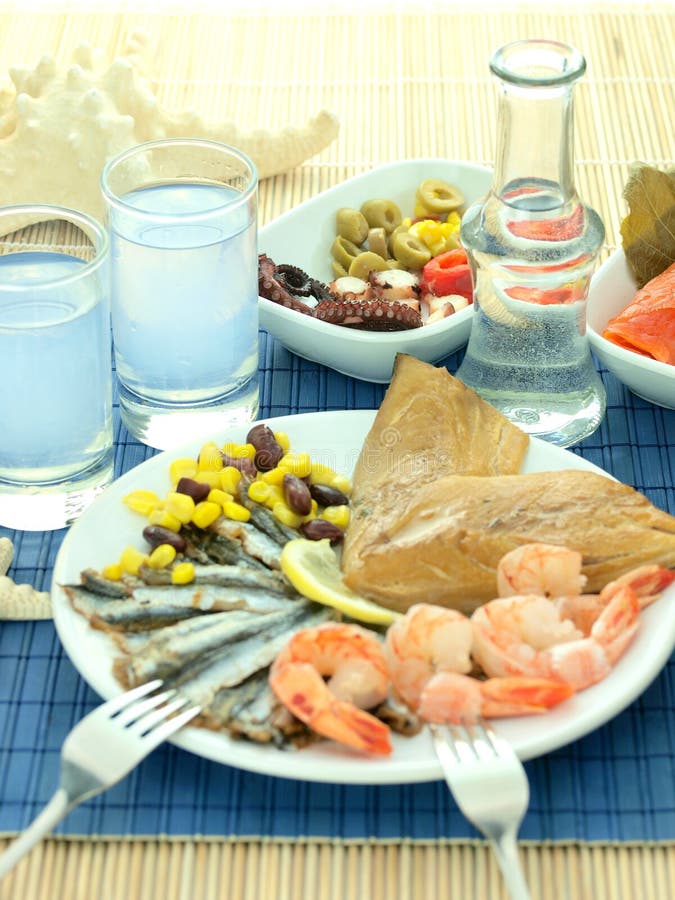 Seafood and ouzo stock image. Image of food, fillet, ouzo - 15468605