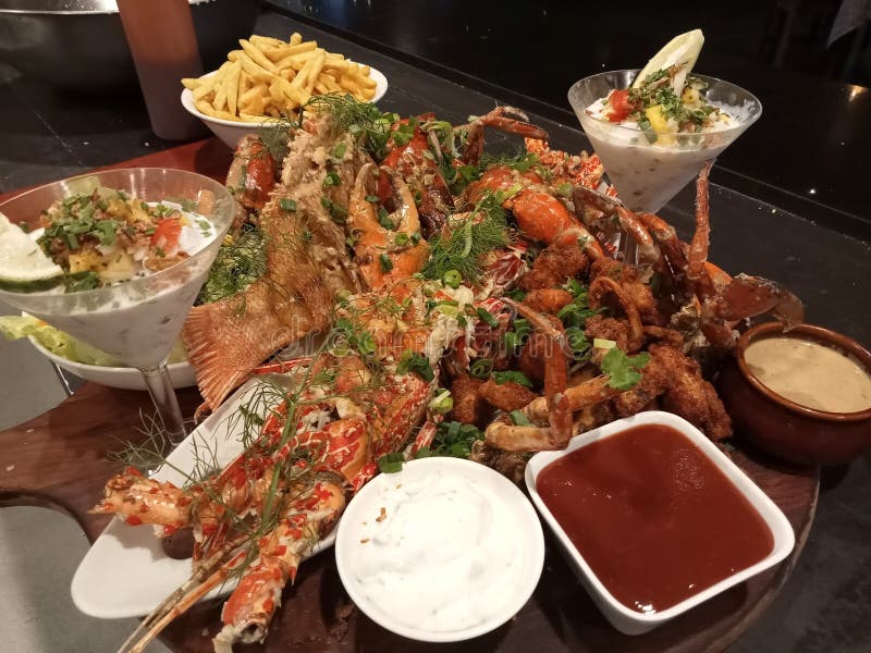 Seafood plater dinner stock photo. Image of dinner, time - 321275108