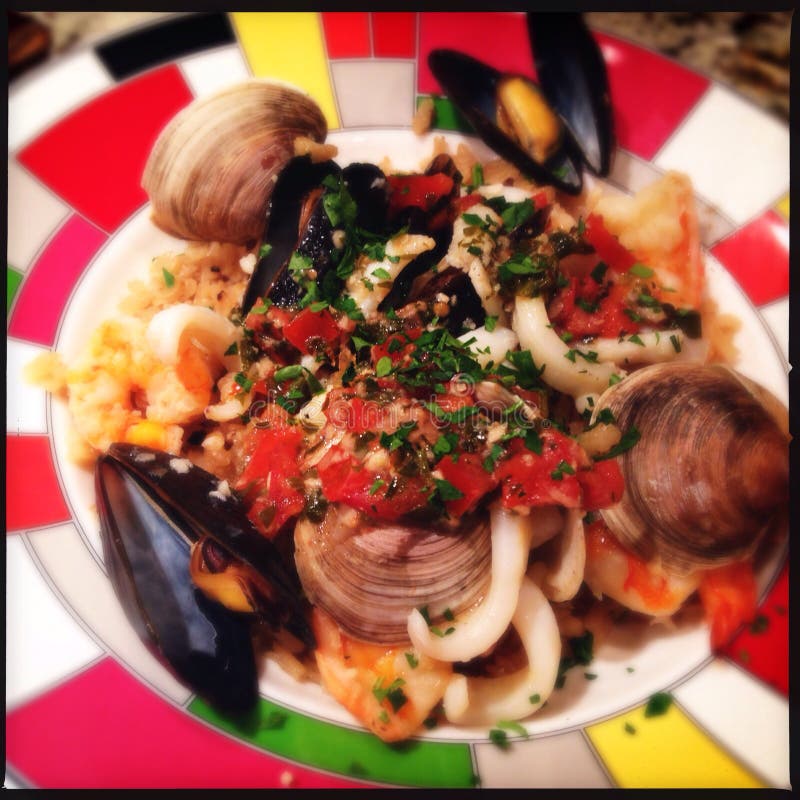 Seafood risotto stock image. Image of seafood, fish, colourful - 49480475