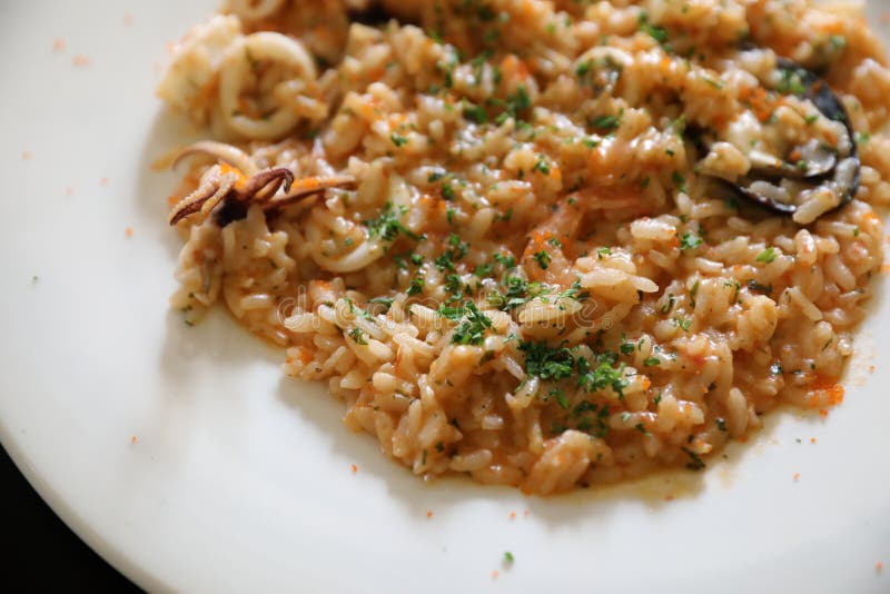 Seafood Risotto , Traditional Italian Rice on Table Stock Photo - Image ...