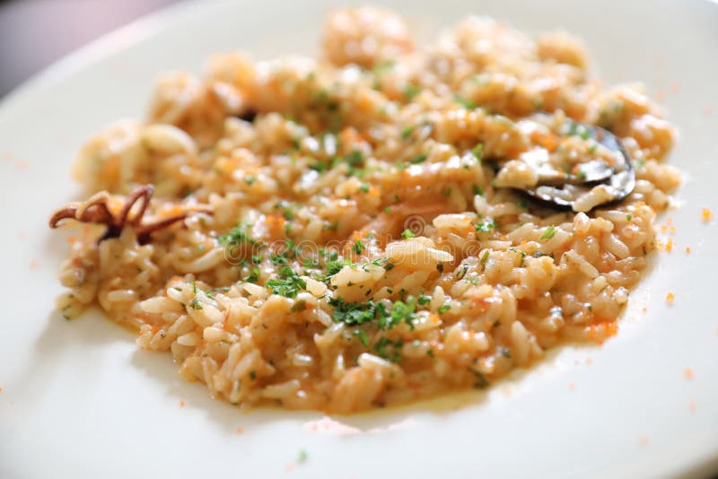 Seafood Risotto , Traditional Italian Rice on Table Stock Photo - Image ...