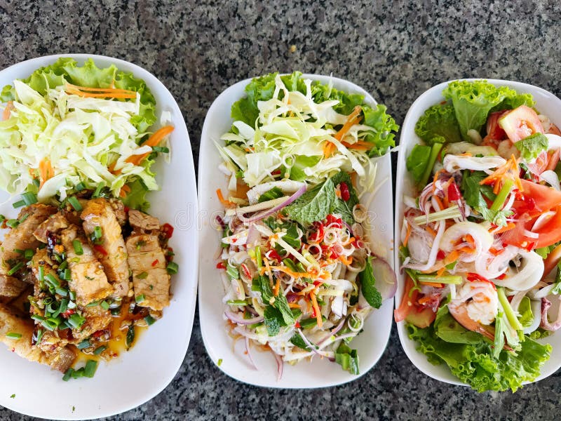 Seafood Salad with Rice and Fish in White Dish on Table Stock Image ...
