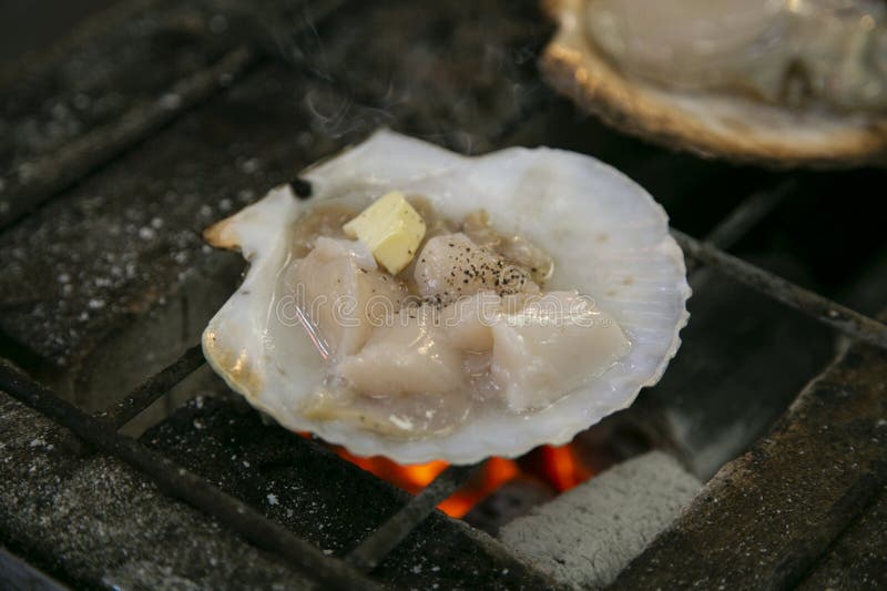 Seafood Shell and Fish Cooked on a Grill at the Osaka Fish Market in ...