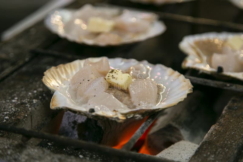 Seafood Shell and Fish Cooked on a Grill at the Osaka Fish Market in ...