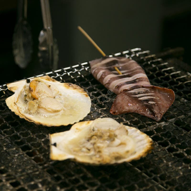 Seafood Shell and Fish Cooked on a Grill at the Osaka Fish Market in ...