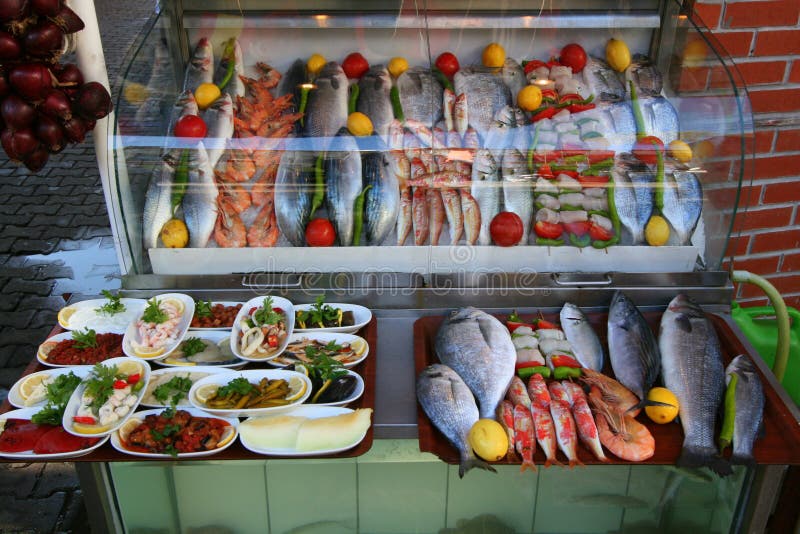 Seafood on Display in Glass Showcase Stock Image - Image of fishes ...