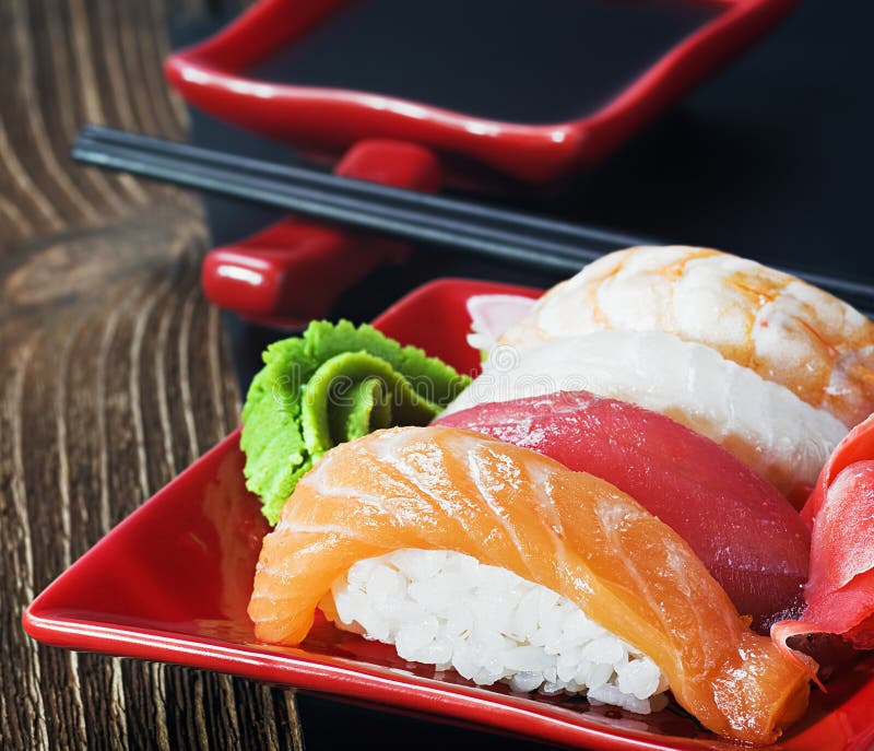 Seafood Sushi and Chopsticks Stock Photo - Image of dish, seaweed: 34203996