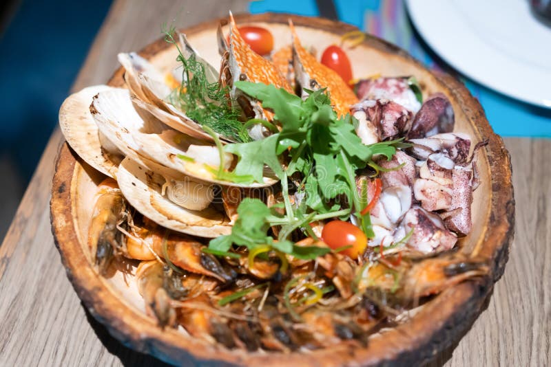 Seafood on Table in Menu at Restaurant Stock Photo - Image of food ...