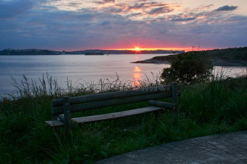 Seafront bench stock photo. Image of reflect, calm, view - 182878000