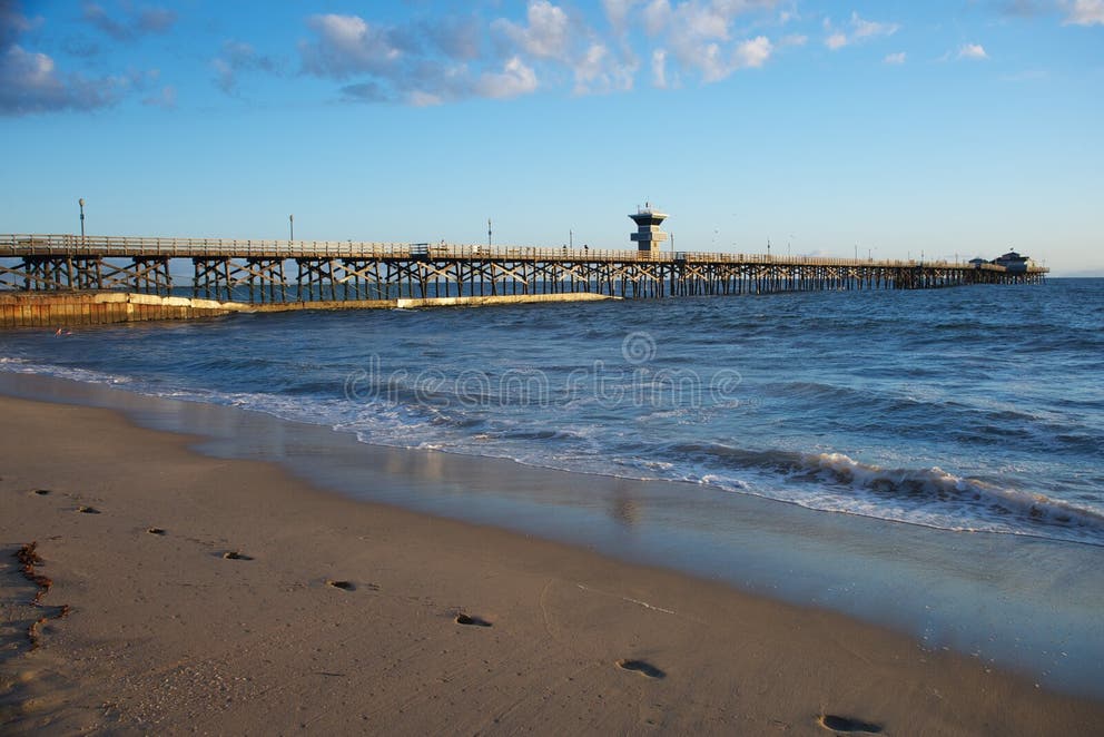 Seal beach pier footprints stock photo. Image of beach - 29051016