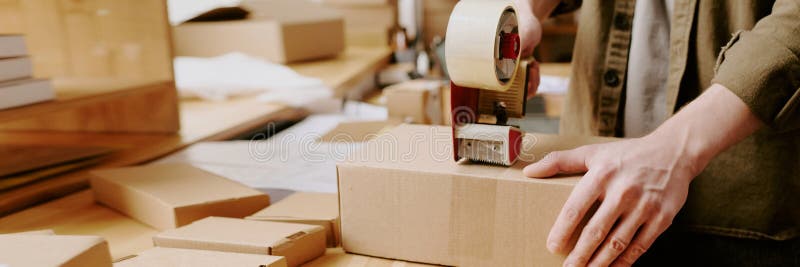 Sealing Boxes with Tape in Shipping Warehouse Stock Image - Image of ...