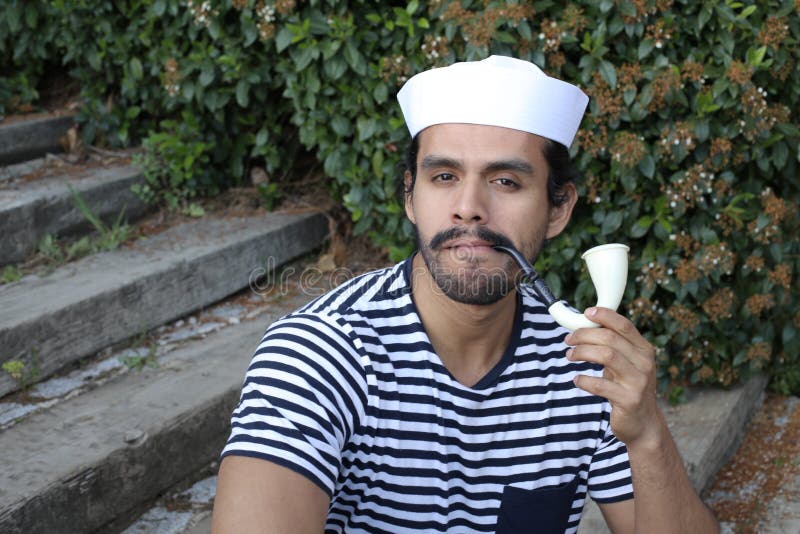 Seaman with Classic Look Smoking Stock Photo - Image of middle, beard ...