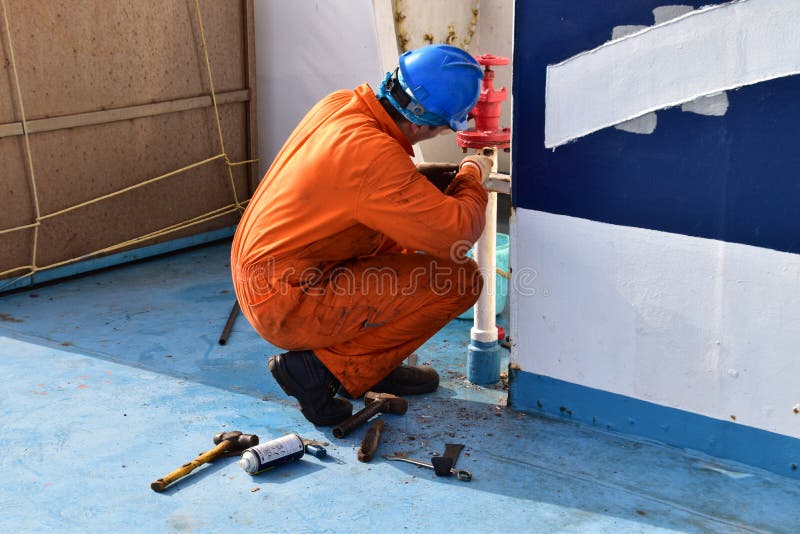 Seamen working on a stage stock photo. Image of seaman - 112039814