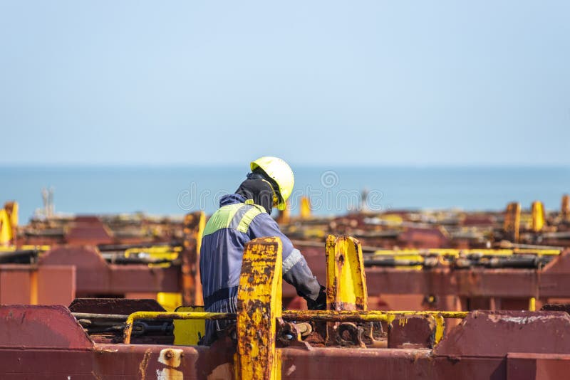 Seaman Working on Deck of the Container Vessel. Stock Photo - Image of ...