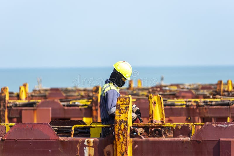 Seaman Working on Deck of the Container Vessel. Stock Image - Image of ...