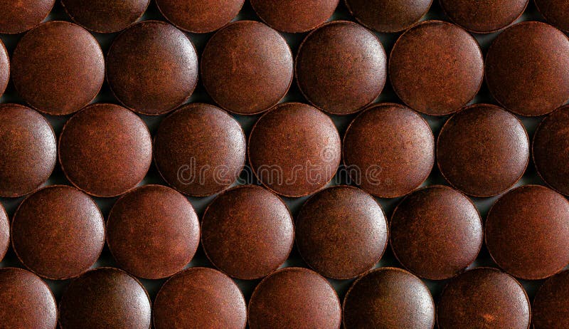 A Seamless Hexagonal Pattern of Many Brown Organic Powder Tablets Laid ...