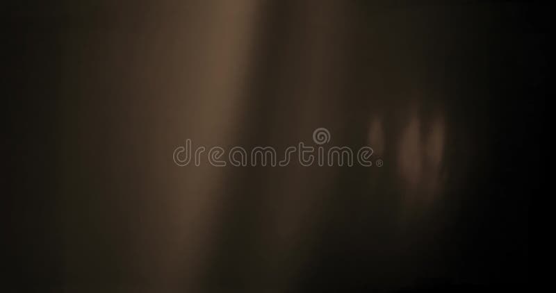 Seamless Loop Light Gold Warm Rays on Black Background, Light in the ...