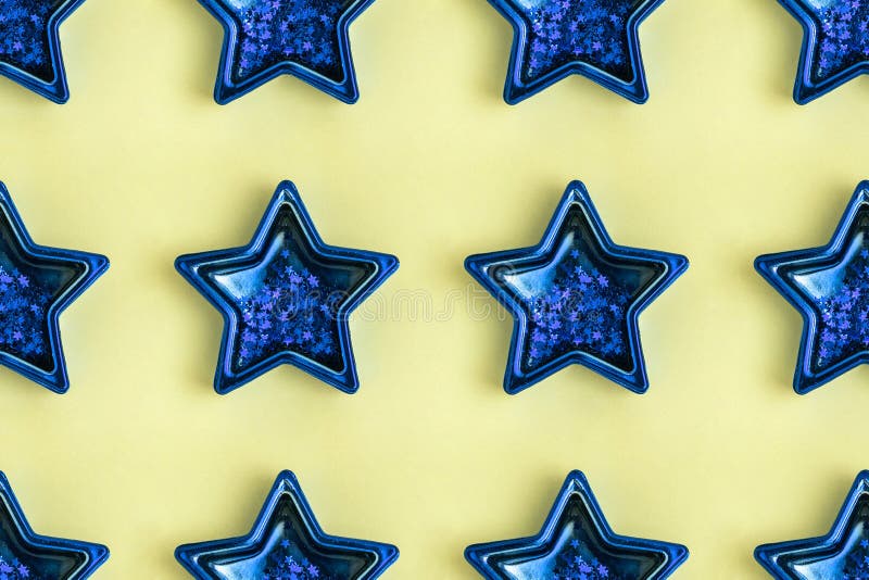 Seamless Pattern from Five Pointed Blue Metallic Star on Yellow Surface ...