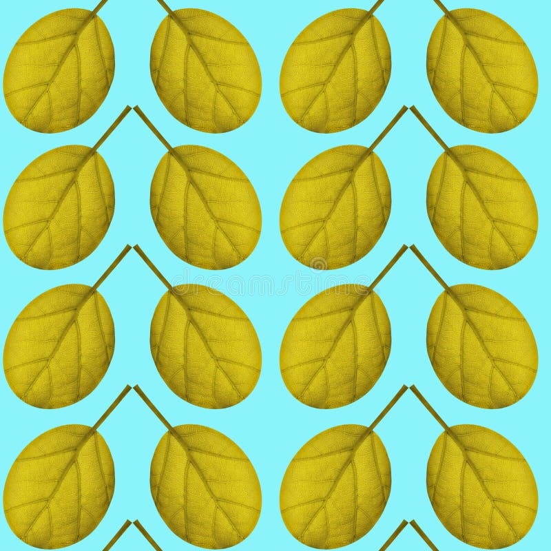 Seamless Pattern of Yellow Leaves on a Blue Background Stock Photo ...