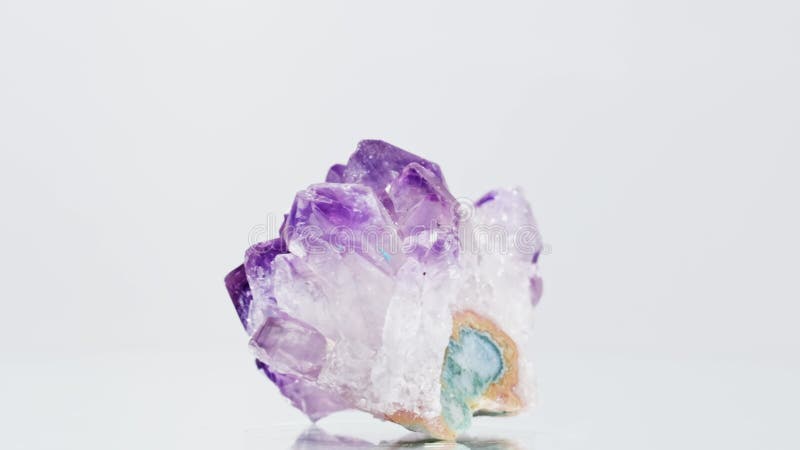Seamlessly Rotating a Purple Mineral Amethyst in Front of White ...