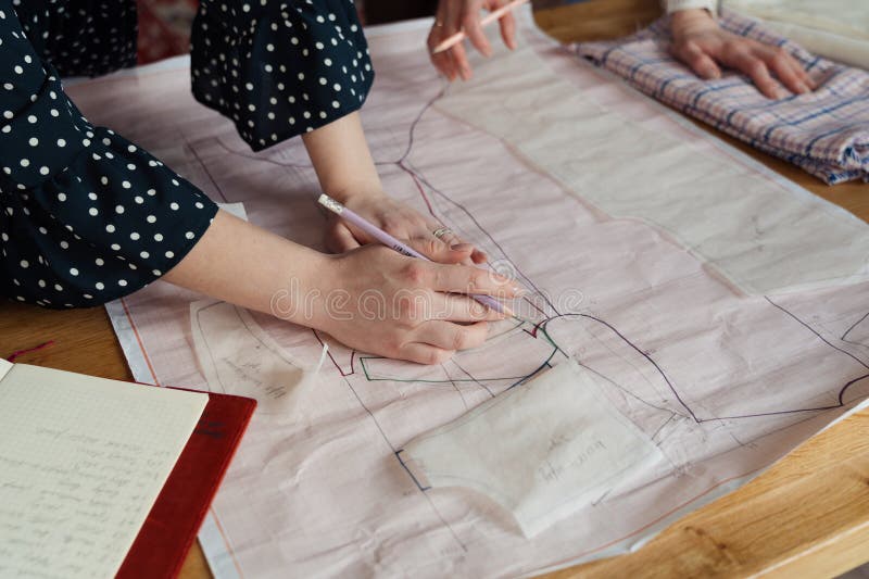 Seamstress and Client Selecting Fabric and Design Stock Image - Image ...
