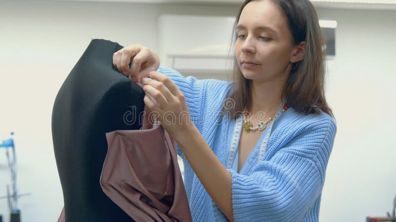 4K. Seamstress Creates an Individual Dress in the Workshop Stock Photo ...