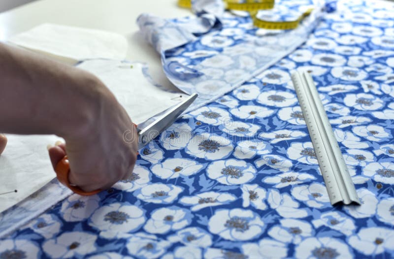 Seamstress Cut Patterned Fabric with Scissors Stock Image - Image of ...