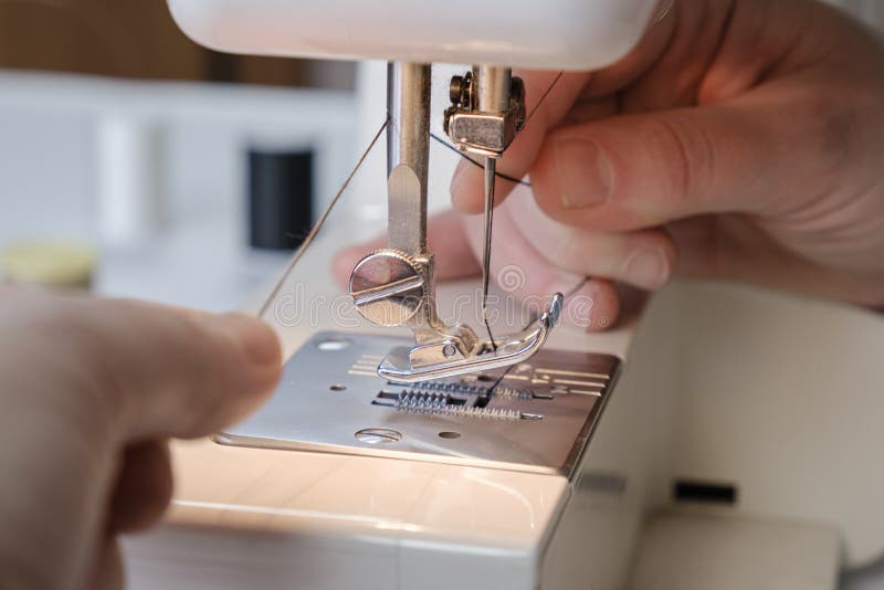 Seamstress Cuts the Thread on an Electric Sewing Machine Stock Image ...