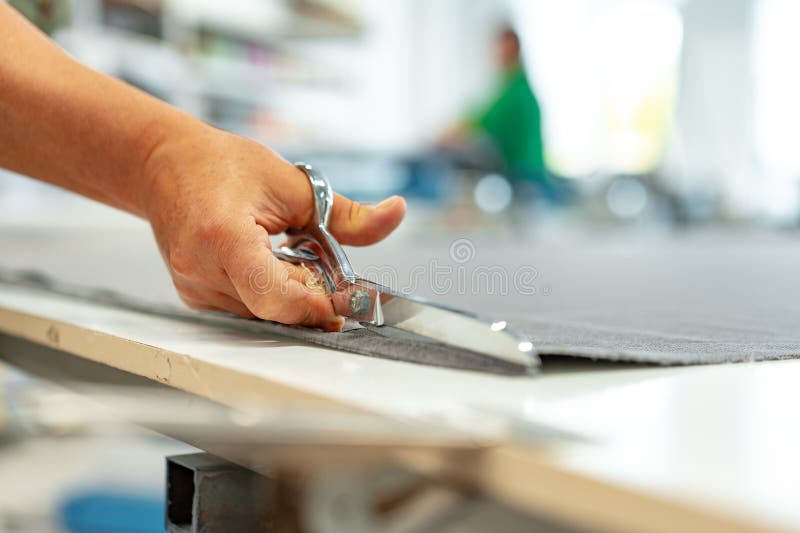 Seamstress Cutting Fabric with Scissors at Table Close Up Stock Image ...