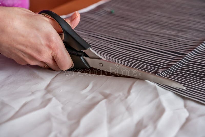 Tailor Cutting Material with a Pair of Sharp Scissors Stock Photo ...