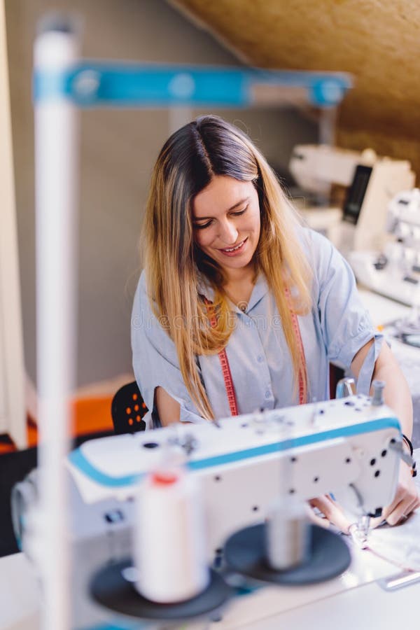 Seamstress Dressmaker Woman Working with Sewing Machine in Workshop ...