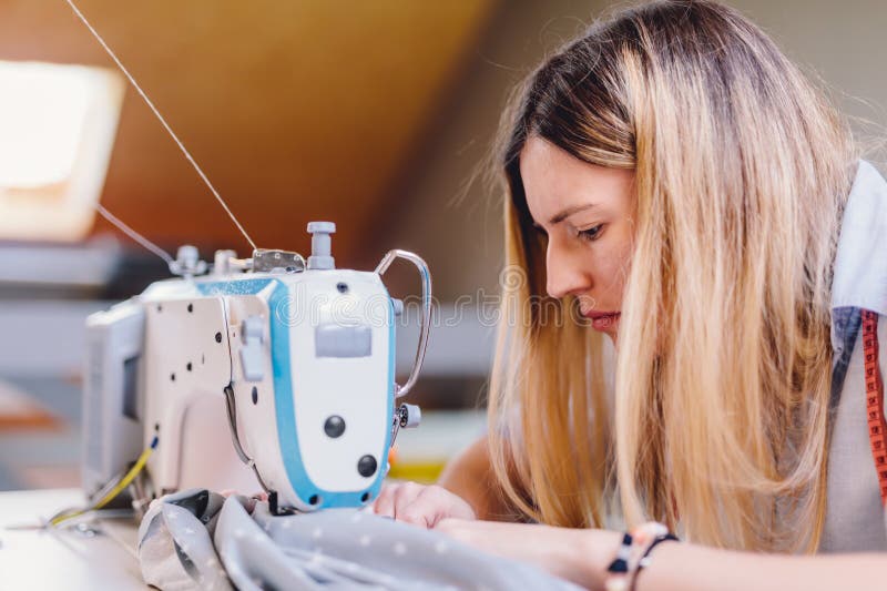 Seamstress Dressmaker Woman Working with Sewing Machine in Workshop ...