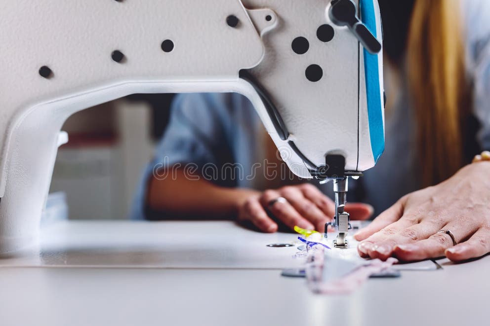 Seamstress Dressmaker Working with Sewing Machine in Workshop Stock ...