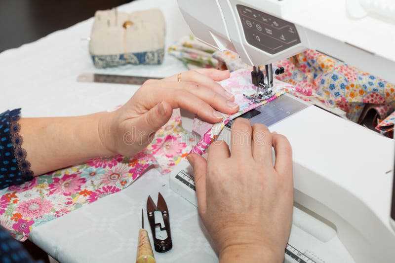 Seamstress Hands at Work, Threads and Needles Stock Photo - Image of ...