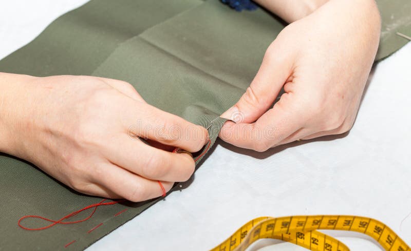 Seamstress Hands at Work, Threads and Needles Stock Image - Image of ...