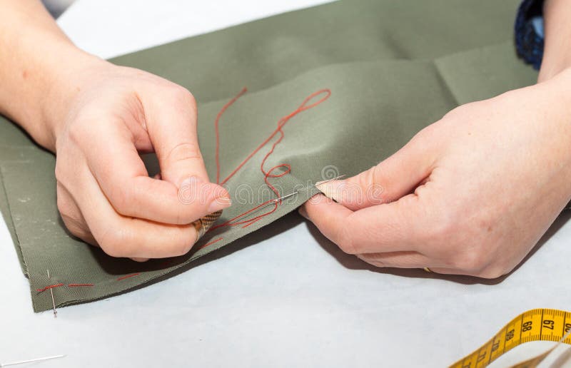 Seamstress Hands at Work, Threads and Needles Stock Image - Image of ...