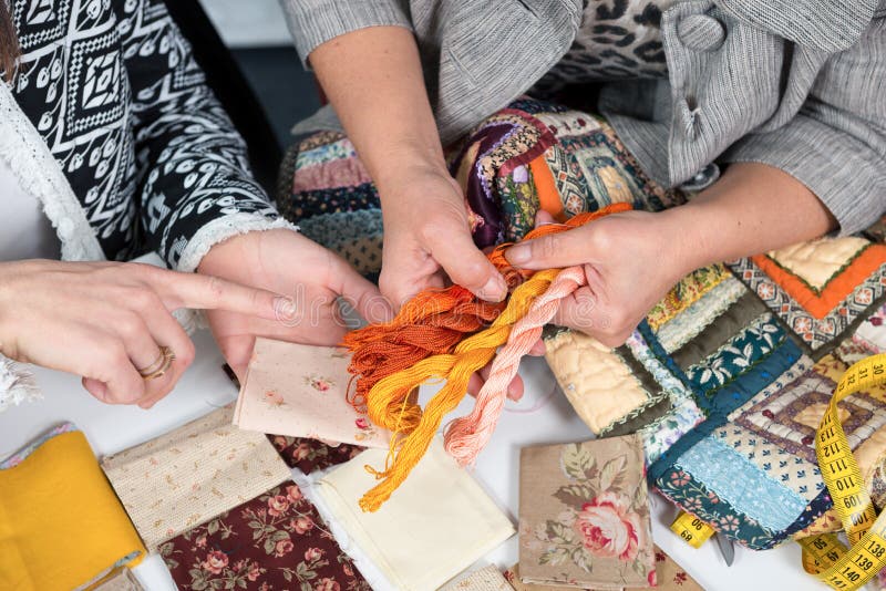 Seamstress and Her Apprentice with Fabric for Patchwork Stock Image ...