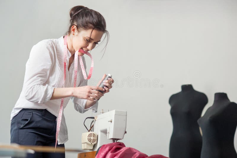 Seamstress Puts New Thread Reels into Sewing Machine Stock Image ...