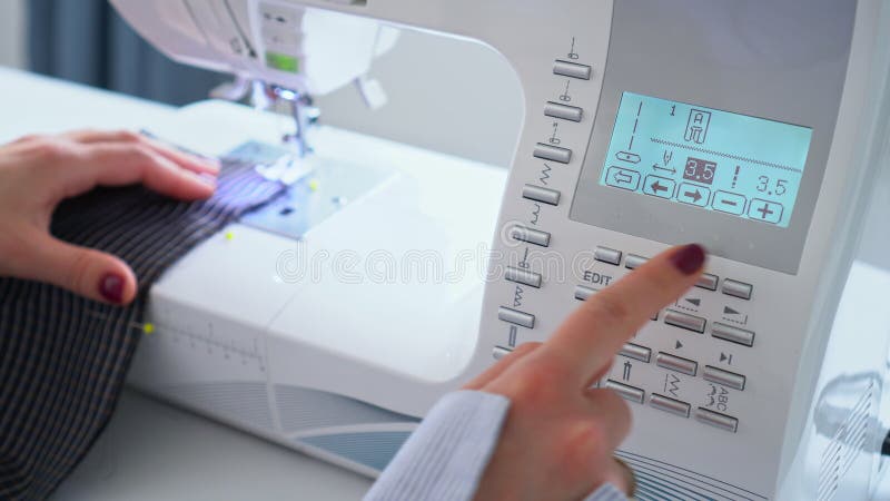 Seamstress Setting Up Sewing Machine with Display. Dressmaker Prepare ...