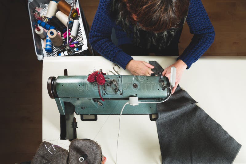Seamstress at Sewing Machine Stock Image - Image of fabric, sewing ...
