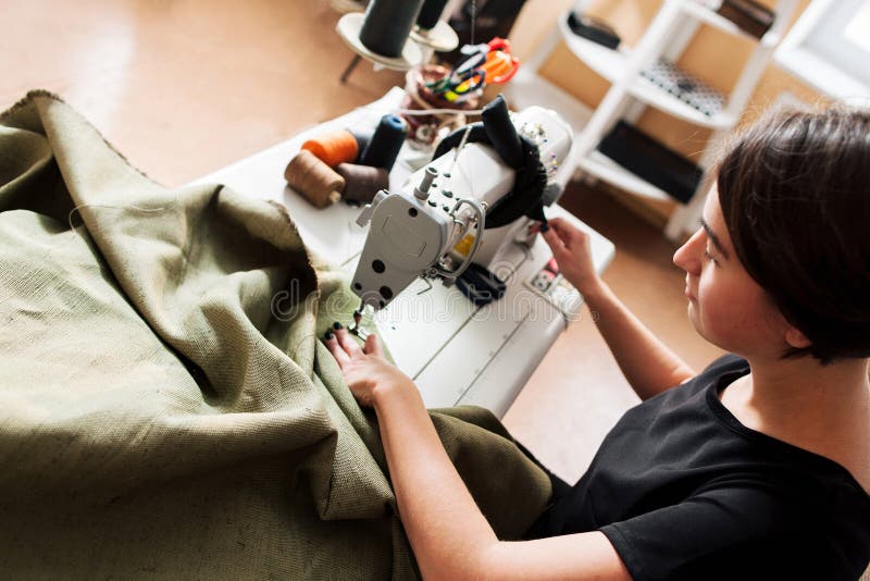 Seamstress Sews Clothes. Workplace of Tailor Stock Photo - Image of ...