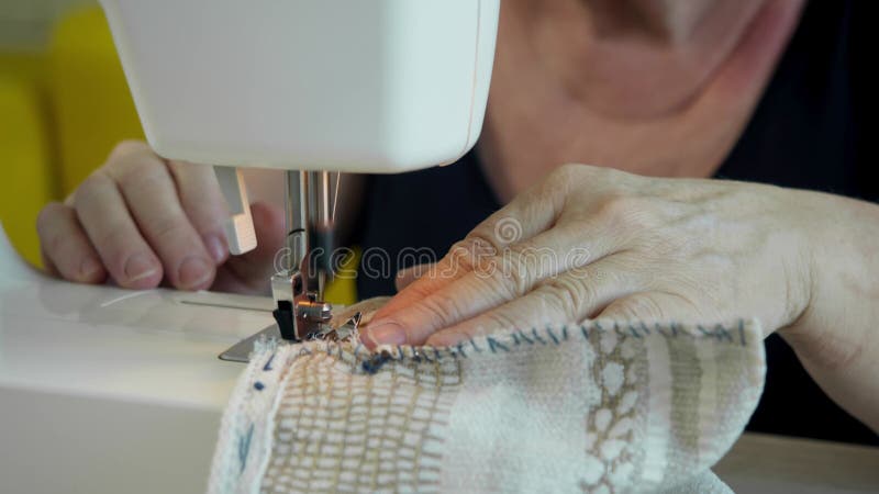Seamstress Stitching Fabric on Sewing Machine Stock Video - Video of ...