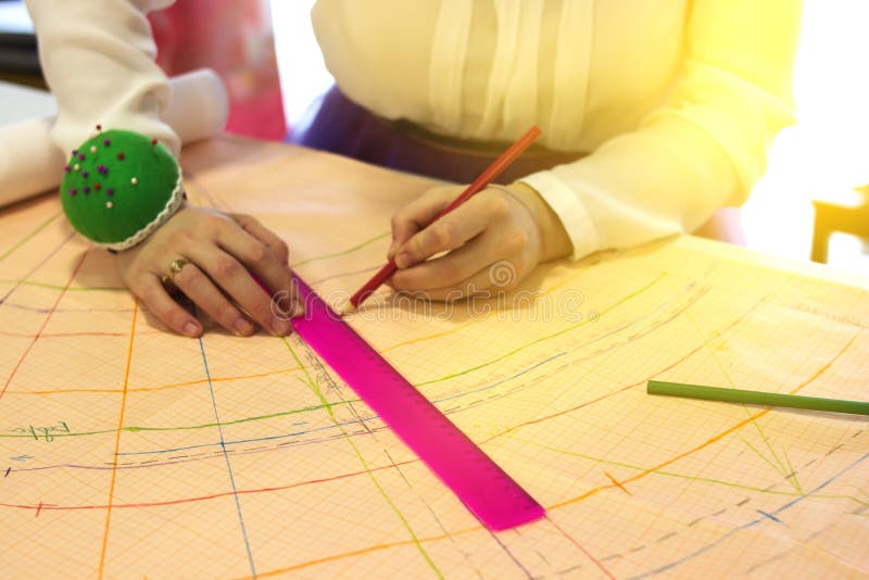 Seamstress, Tailor, Cutter with Ruler and Pencil. Pattern Stock Photo ...